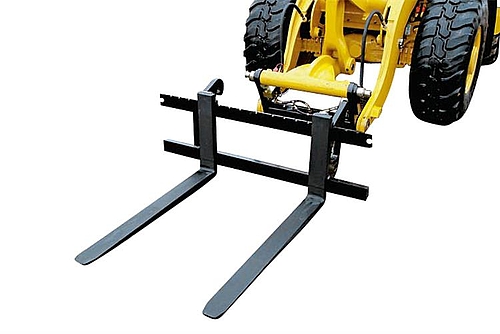 Hier mieten: Ladegabel für CAT938 Fusion Aufnahme | Zeppelin Rental